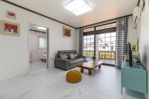 Quarto (Jasmine) | Sala de estar | TV de ecrã plano 