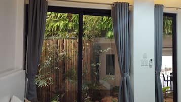 Deluxe with Garden View (1QB) | 1 quarto, frigobar, cofres nos quartos, individualmente decorados