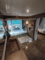 Cabana exclusivo, 1 quarto | Banheiro | Chuveiro, produtos de toalete grátis, secador de cabelo