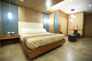 Quarto Deluxe | Escrivaninha, Wi-Fi de cortesia, roupa de cama