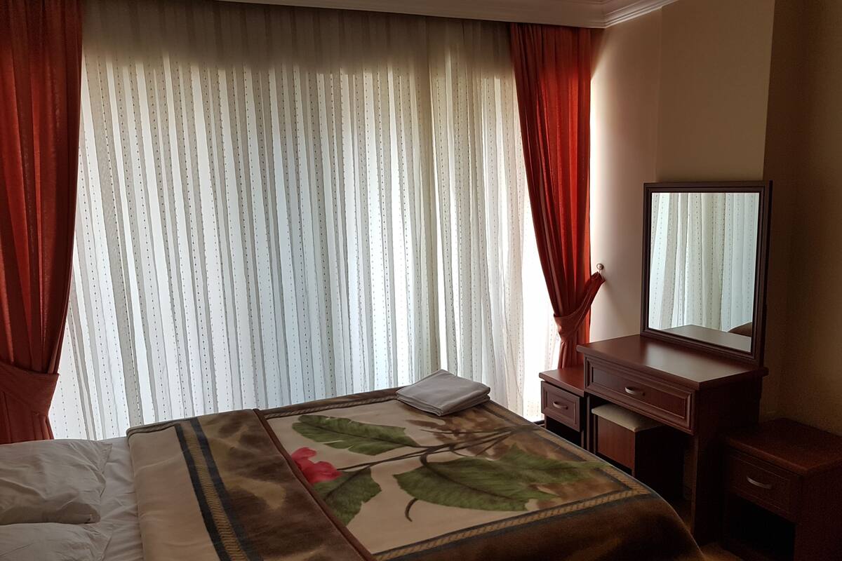 Apartamento | Área de estar | TV
