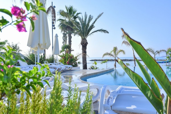 Na praia, toalhas de praia