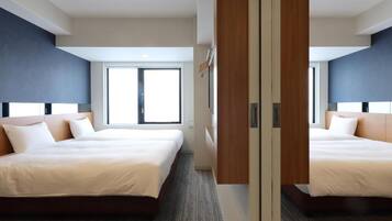 Quarto Twin | Edredões de penas, secretária, cortinas/cortinados opacos, Wi-fi grátis