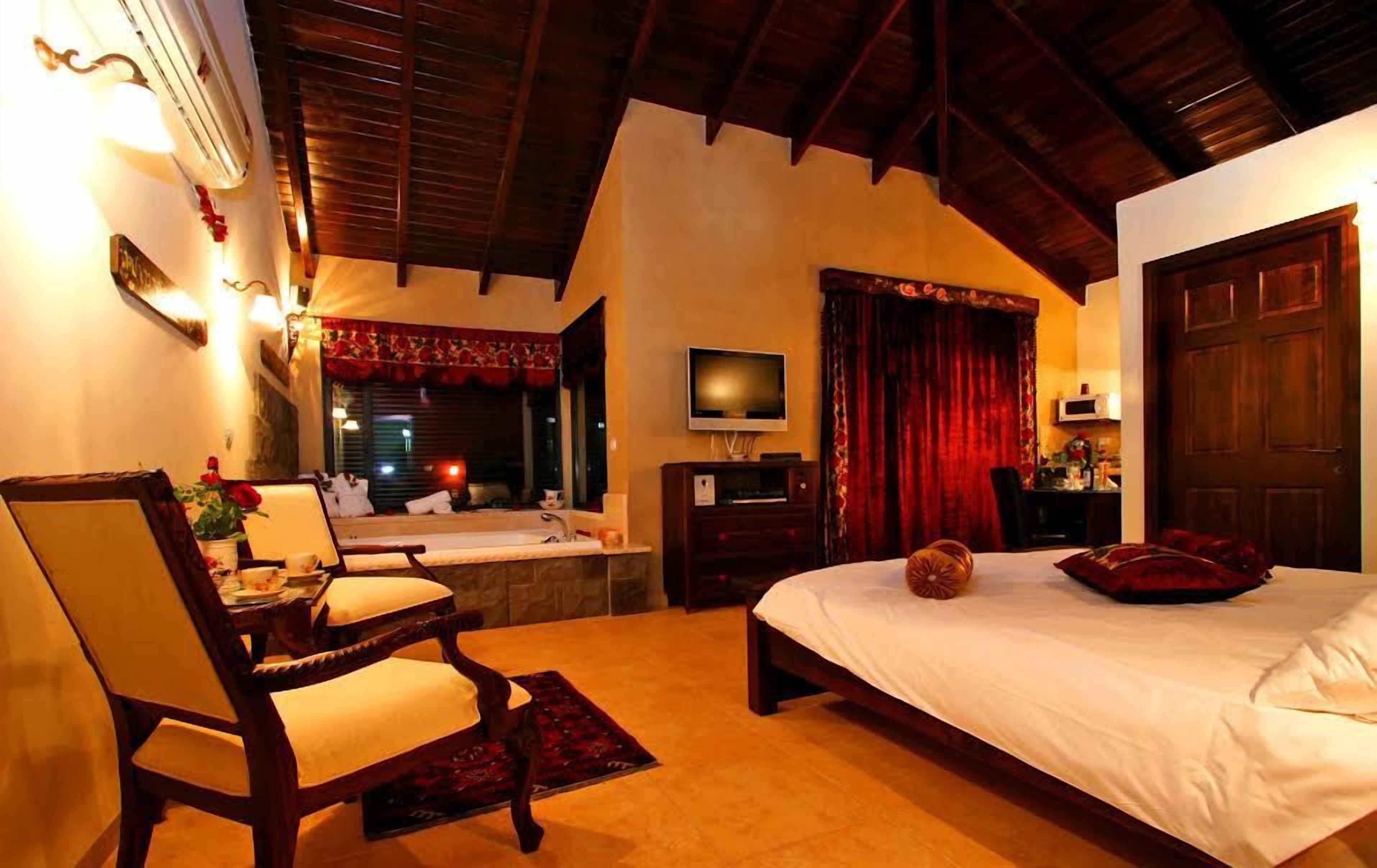 Suíte estúdio luxo | Edredons de pluma, camas Select Comfort, frigobar, escrivaninha