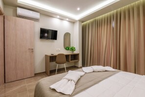 Apartamento Superior | Secretária, quartos insonorizados, ferro/tábua de engomar 