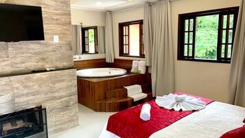 Quarto Duplo Deluxe, 1 cama king-size, banheira de hidromassagem | Minibar, Wi-fi grátis, roupa de cama fornecida