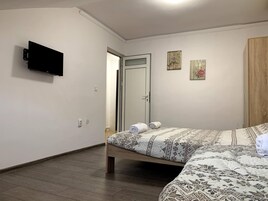 Apartamento Standard, 1 quarto | Roupa de alta qualidade, minibar, com decoração personalizada 