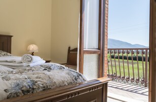 Quarto Triplo, pátio, vista para o jardim | Vista do quarto