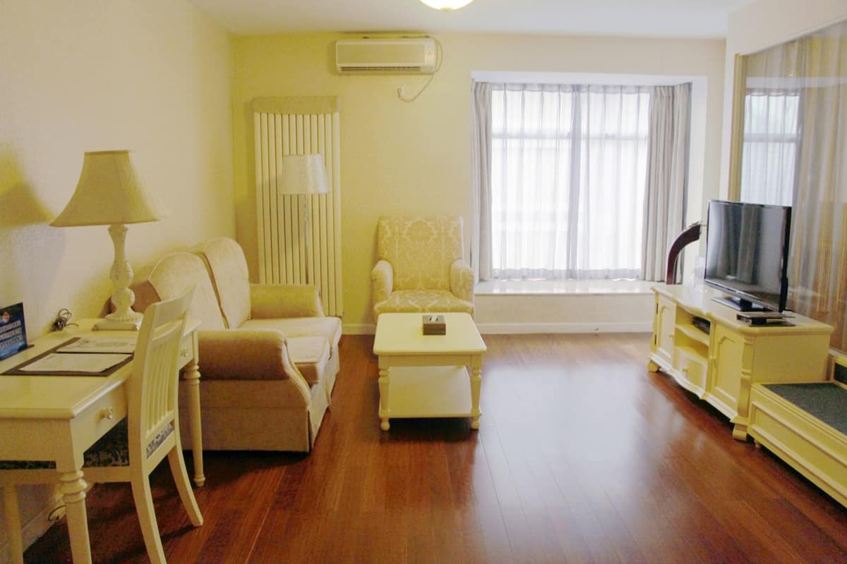 Suite Exclusiva | Sala | Televisor LCD