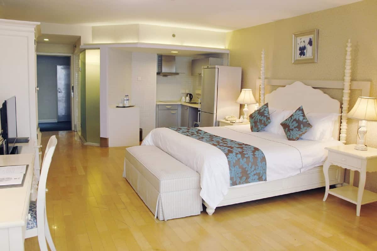 Quarto Exclusivo | Minibar, cofre no quarto, secretária, cortinas/cortinados opacos