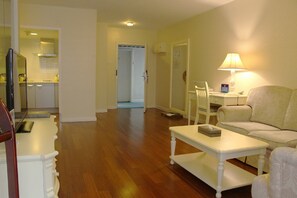 Suíte exclusiva | Sala de estar | TV LCD