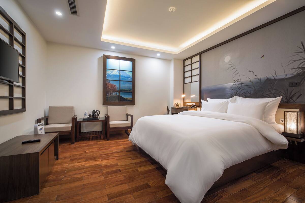 Quarto superior | 1 quarto, roupas de cama premium, frigobar, cofres nos quartos