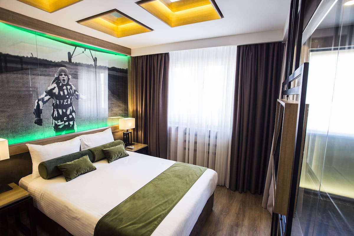 Quarto Duplo Deluxe | Roupa de alta qualidade, minibar, cofre no quarto
