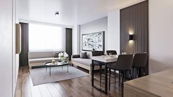 Suite | Sala de estar | Televisor LED de 127 cm com canais via satélite, televisor