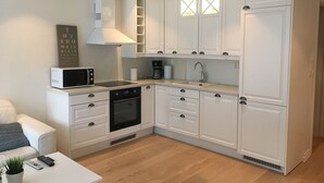 Apartamento Deluxe, 2 quartos | Cozinha privada