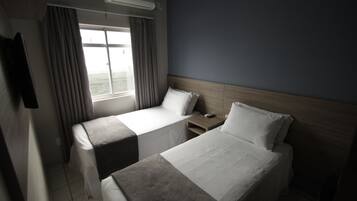 Quarto duplo | Frigobar, cortinas blackout, Wi-Fi de cortesia