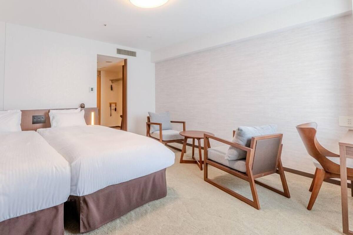 Edredons de pluma, cortinas blackout, Wi-Fi de cortesia, roupa de cama