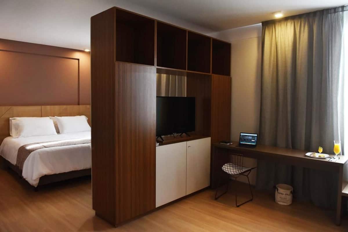 Suite Executiva | Roupa de alta qualidade, edredões de penas, camas de colchão pillowtop 