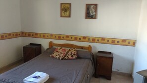 Quarto casal standard, 1 cama Queen | Wi-Fi de cortesia