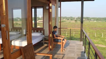 Quarto quádruplo família, 1 quarto, terraço, vista para o jardim | Sacada