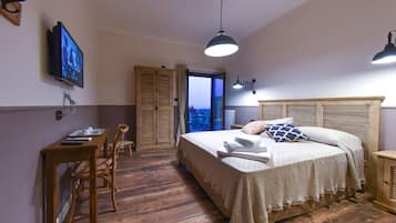 Quarto casal, vista para o mar | Roupas de cama premium, frigobar, escrivaninha, cortinas blackout