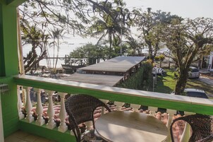 Suíte estúdio superluxo, vista para o mar | Frigobar, cortinas blackout, ferros/tábuas de passar roupa