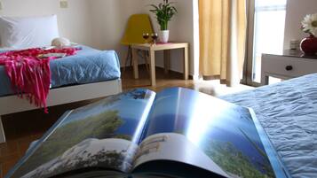 Cofre no quarto, ferro/tábua de engomar