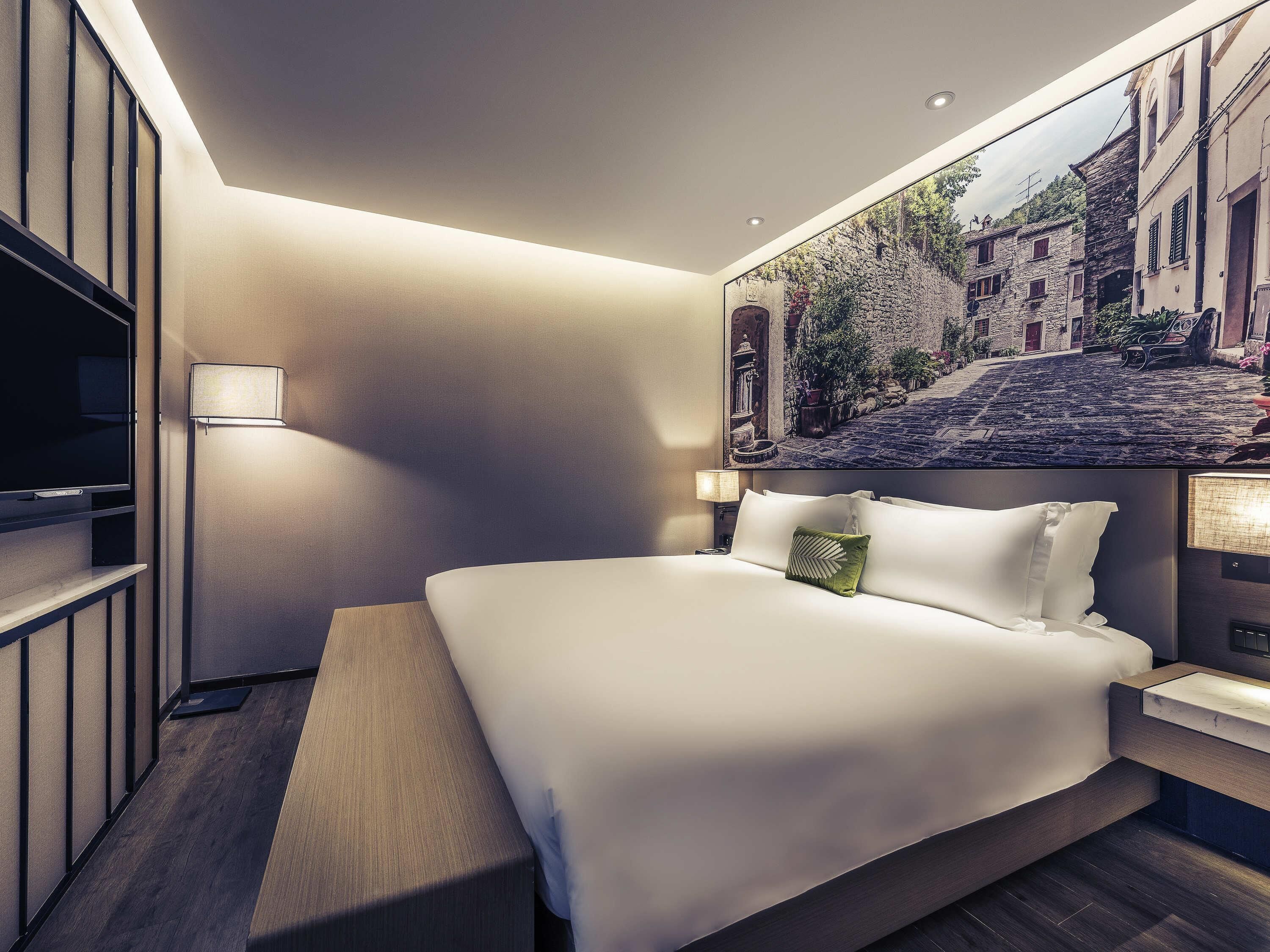 Suíte executiva, 1 cama King, acessível | Frigobar, cofres nos quartos, escrivaninha, quartos à prova de som