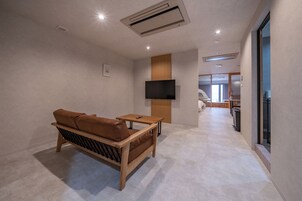 Suíte presidencial, para não fumantes | Frigobar (abastecido com itens grátis), cortinas blackout