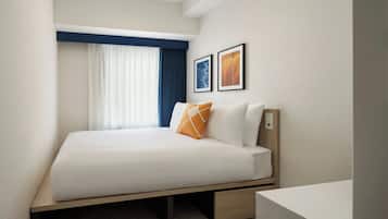 Escrivaninha, cortinas blackout, Wi-Fi de cortesia, roupa de cama