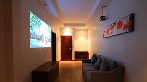 Suite Premium, 1 quarto | Sala de estar | TV de ecrã plano