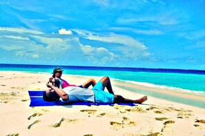 Massagens na praia, ioga 