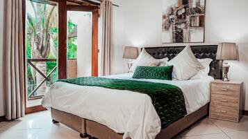 Quarto Deluxe | Ferro/tábua de engomar, roupa de cama fornecida