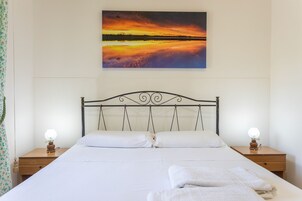 Apartamento premium | Wi-Fi de cortesia, roupa de cama