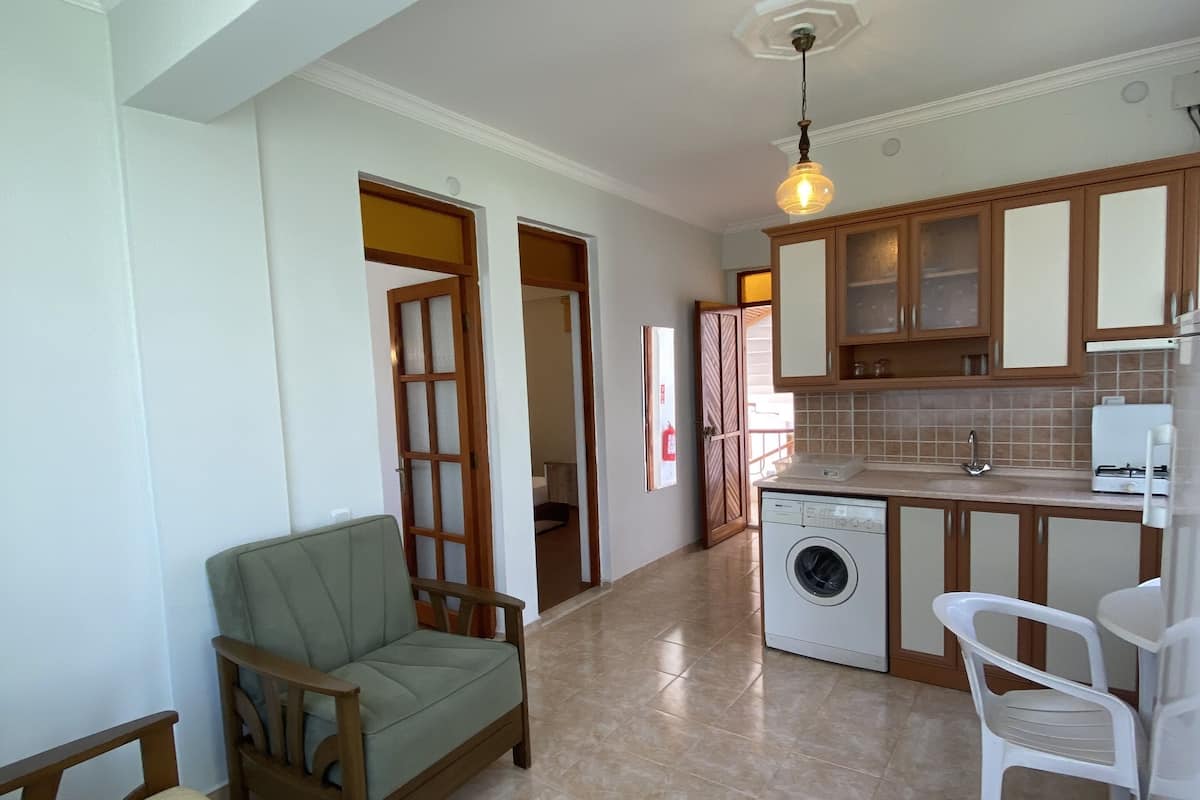 Apartamento família, 2 quartos, cozinha, vista para a cidade | 2 quartos, escrivaninha, quartos à prova de som, Wi-Fi de cortesia