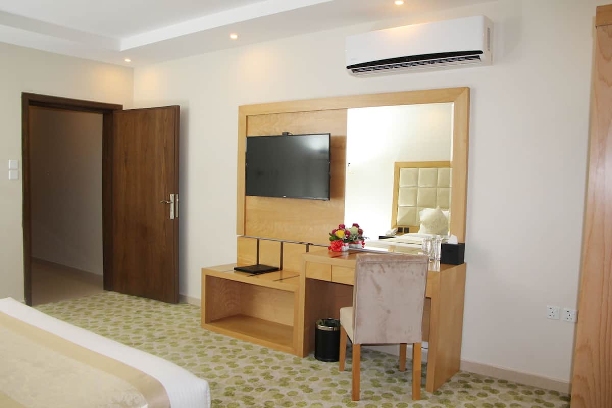 Suíte júnior | 1 quarto, roupas de cama premium, frigobar, cofres nos quartos