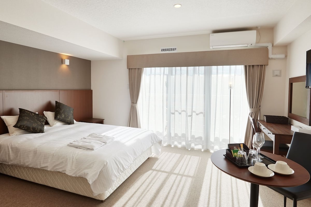 Quarto Duplo (Condominium Type) | Cortinas/cortinados opacos, Wi-fi grátis, roupa de cama fornecida