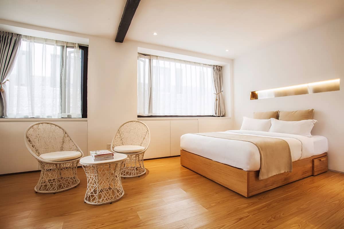 Suite Júnior, vista para o pátio | Minibar, cofre no quarto, secretária, cortinas/cortinados opacos