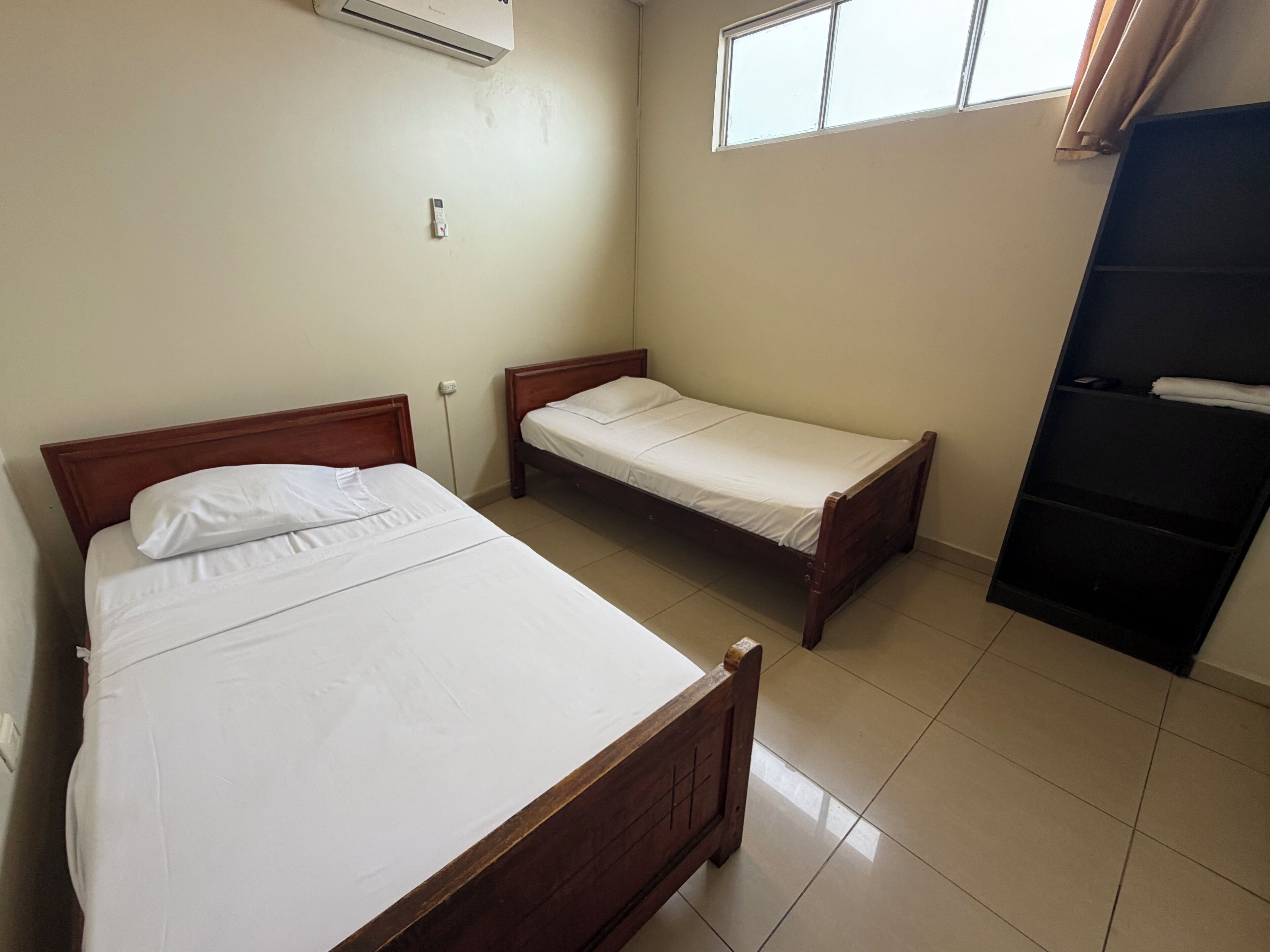 Quarto Duplo, 2 camas individuais | Ferro/tábua de engomar, Wi-fi grátis 