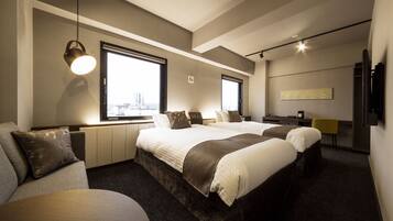 Quarto Twin Deluxe, não fumadores | Secretária, Wi-fi grátis, roupa de cama fornecida