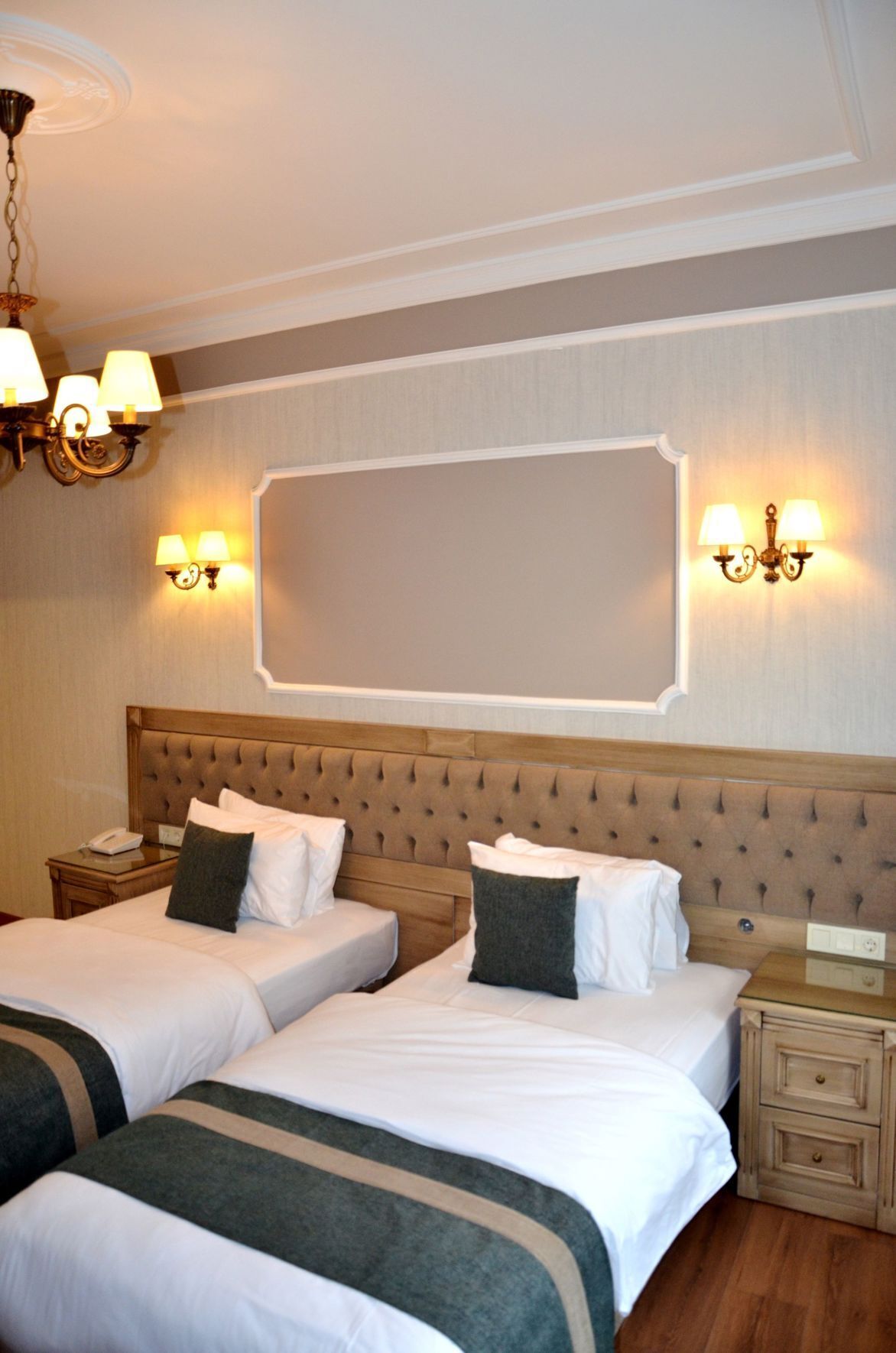 Roupas de cama premium, cofres nos quartos, individualmente decorados