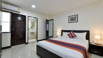 Deluxe Suite | Cofre no quarto, cortinas/cortinados opacos, Wi-fi grátis