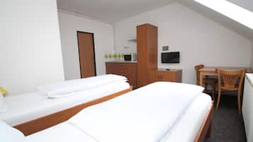 Suíte, 2 quartos, cozinha | 1 quarto, escrivaninha, cortinas blackout, berços grátis