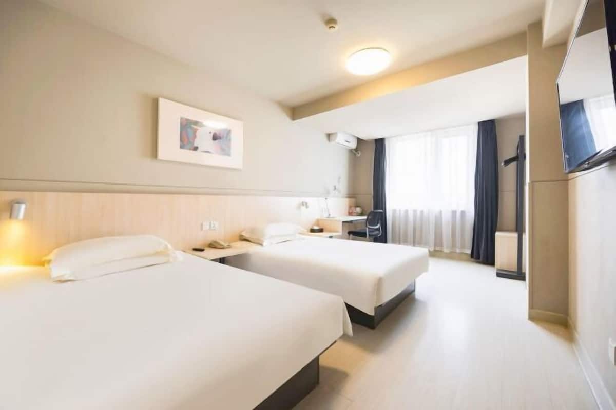 Wi-Fi de cortesia, roupa de cama