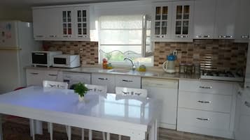 Condo família, vários quartos, cozinha americana | Cozinha compartilhada