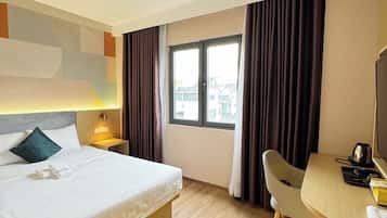 Quarto Superior, 1 cama queen-size | Roupa de alta qualidade, minibar, com mobília individualizada