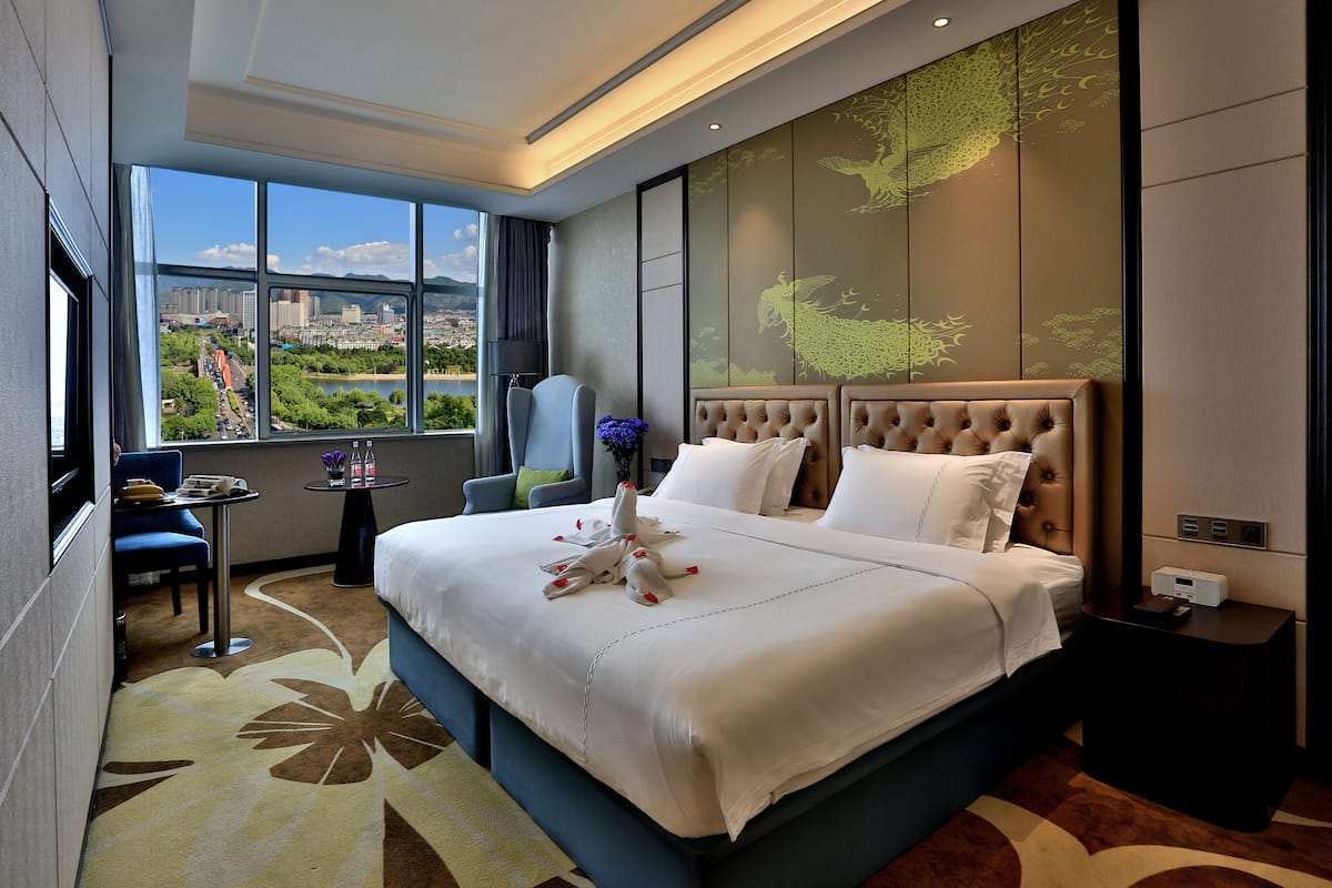 Quarto casal | Roupas de cama premium, frigobar, cofres nos quartos, escrivaninha