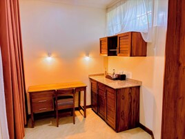 Quarto Executivo | Sala de estar | TV de ecrã plano 