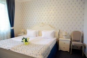 Suíte | Frigobar, cofres nos quartos, ferros/tábuas de passar roupa