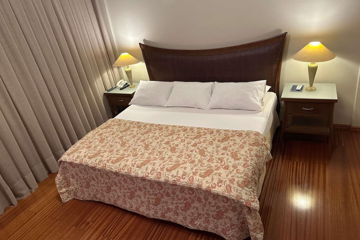 Suite de Luxo, 1 cama king-size | Minibar, Wi-fi grátis, roupa de cama fornecida